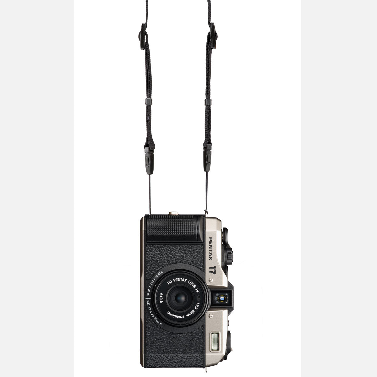 Compact film camera with fixed focal length, designed to capture half ...